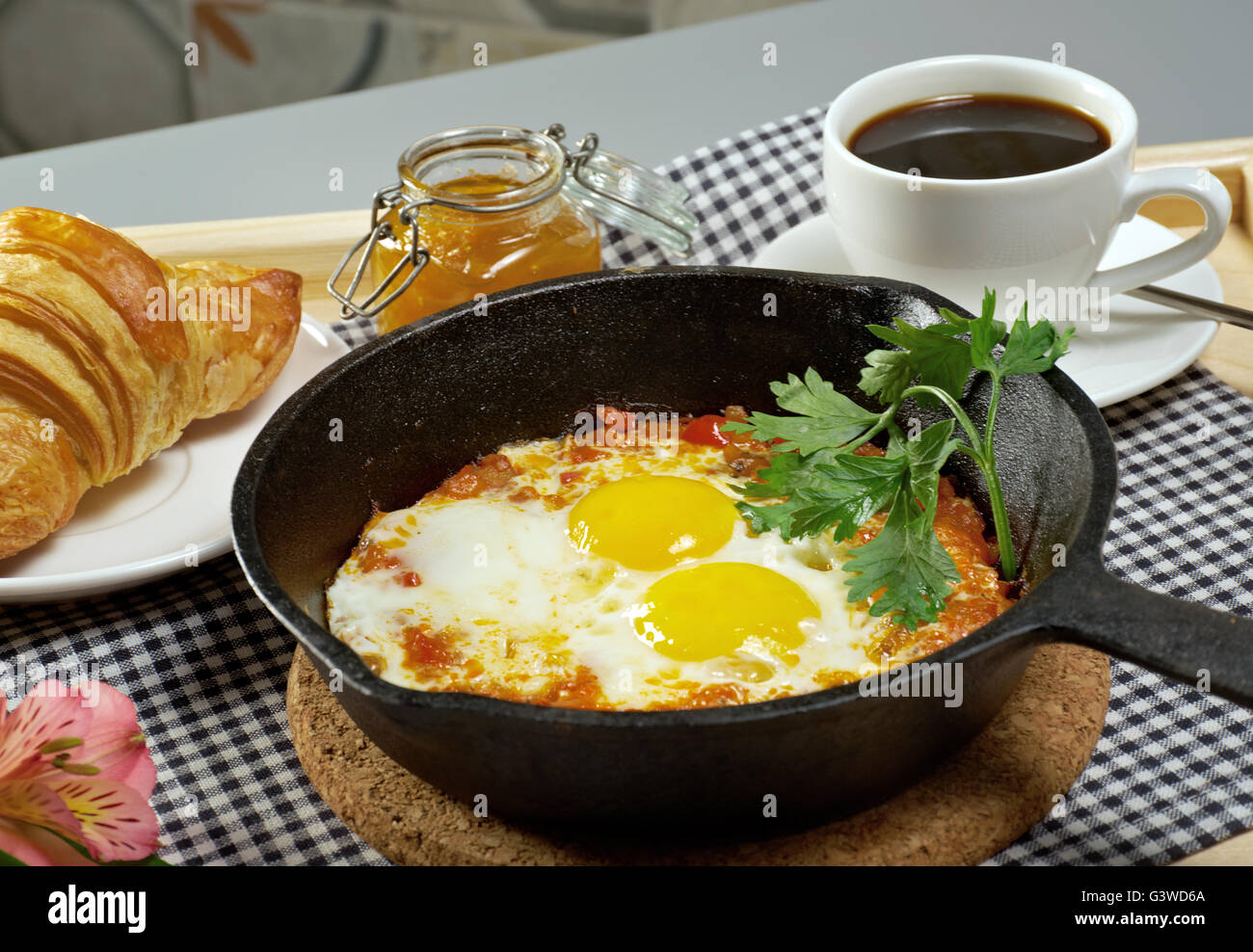 Summer Morning Breakfast. plate of croissant, scrambled eggs and coffee ...