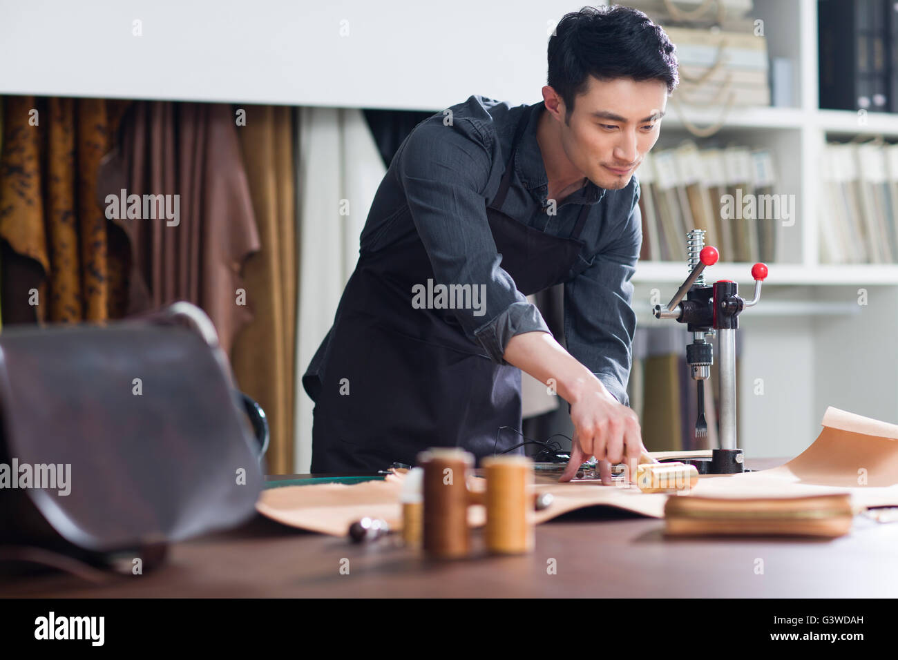 Craftsman working in his studio Stock Photo - Alamy
