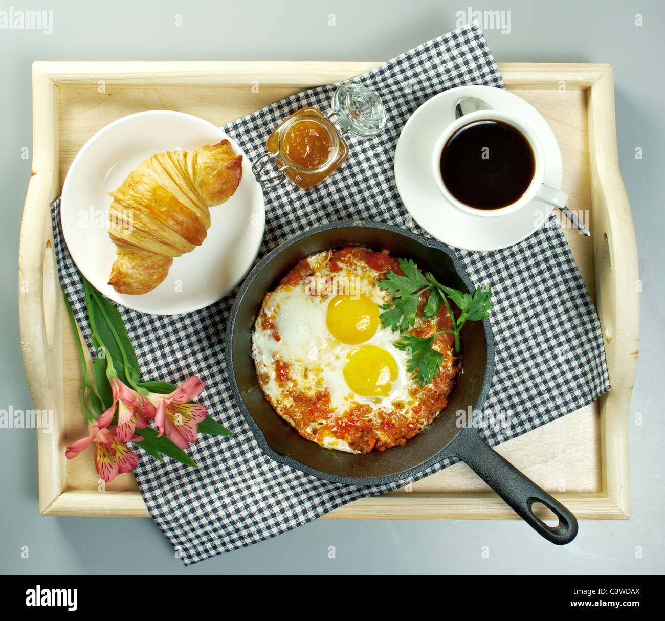 Summer Morning Breakfast. plate of croissant, scrambled eggs and coffee ...