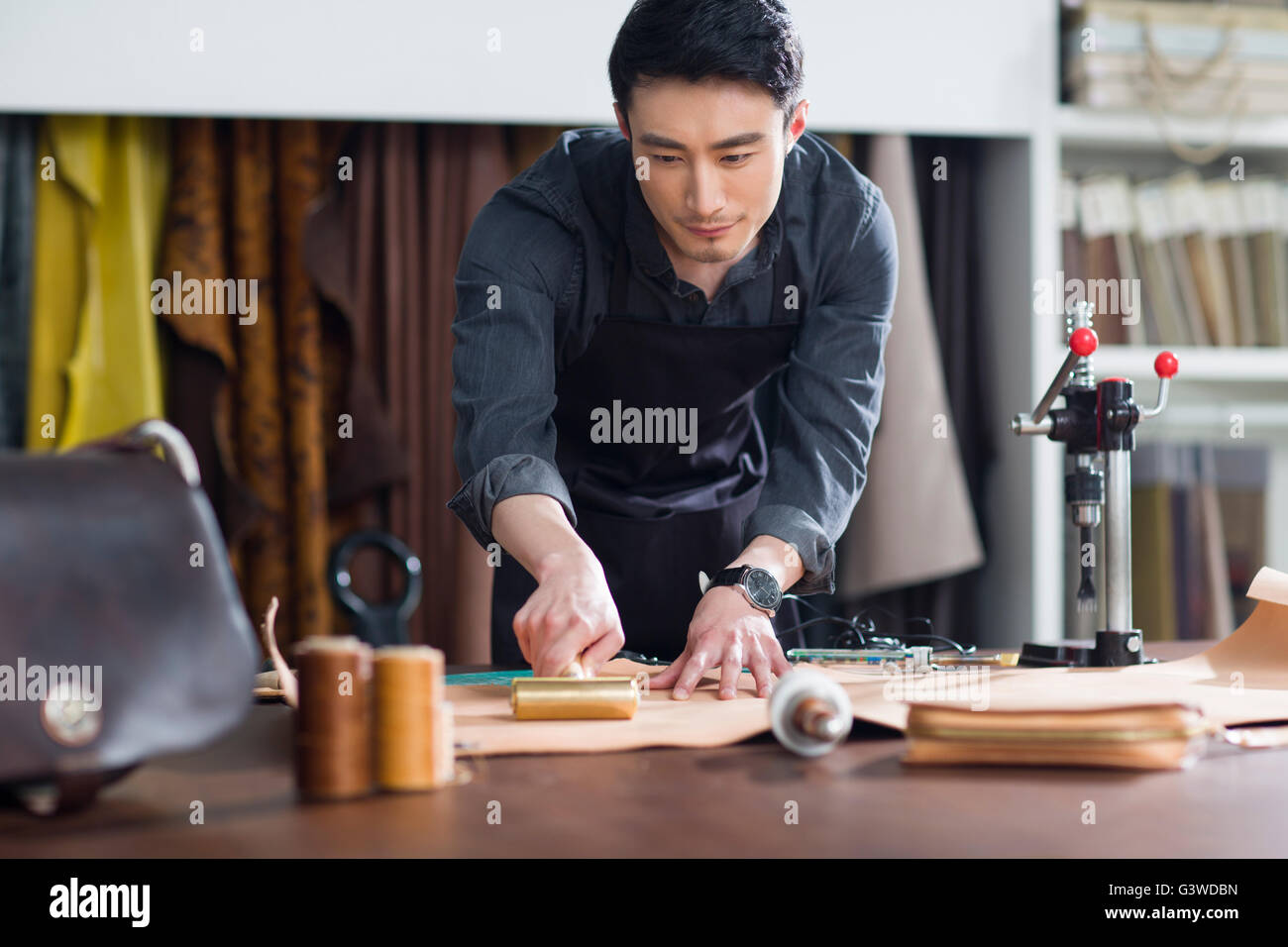 Craftsman working in his studio Stock Photo - Alamy