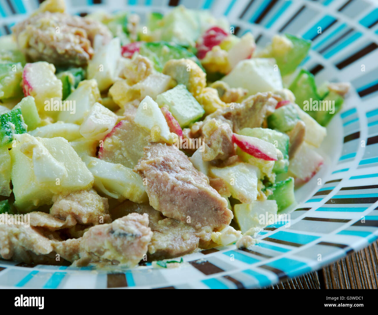 Russian Salad with cod liver and vegetables Stock Photo - Alamy