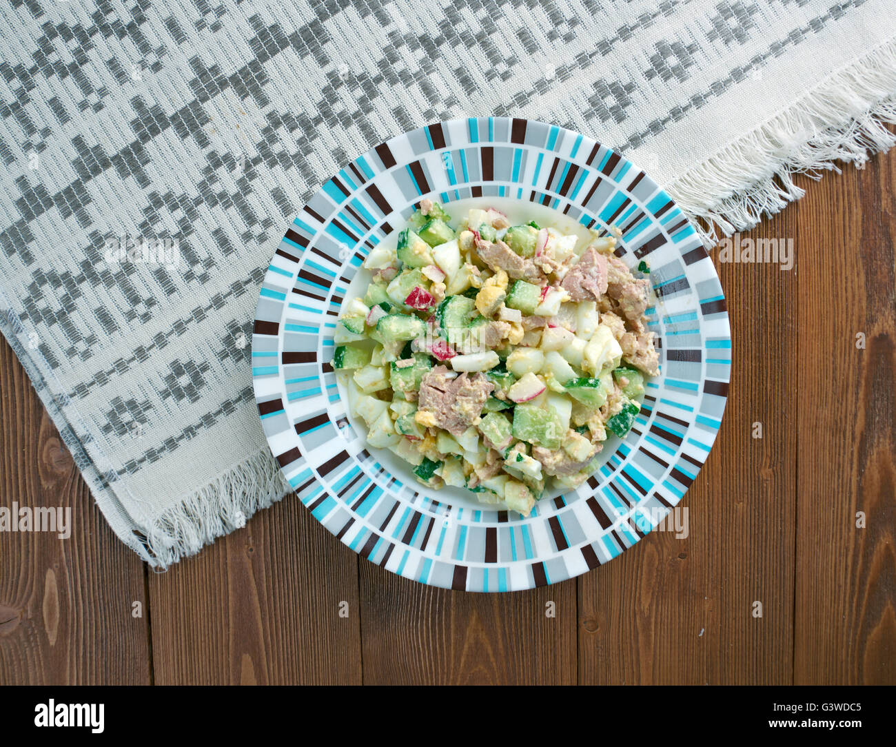 Russian Salad with cod liver and vegetables Stock Photo - Alamy