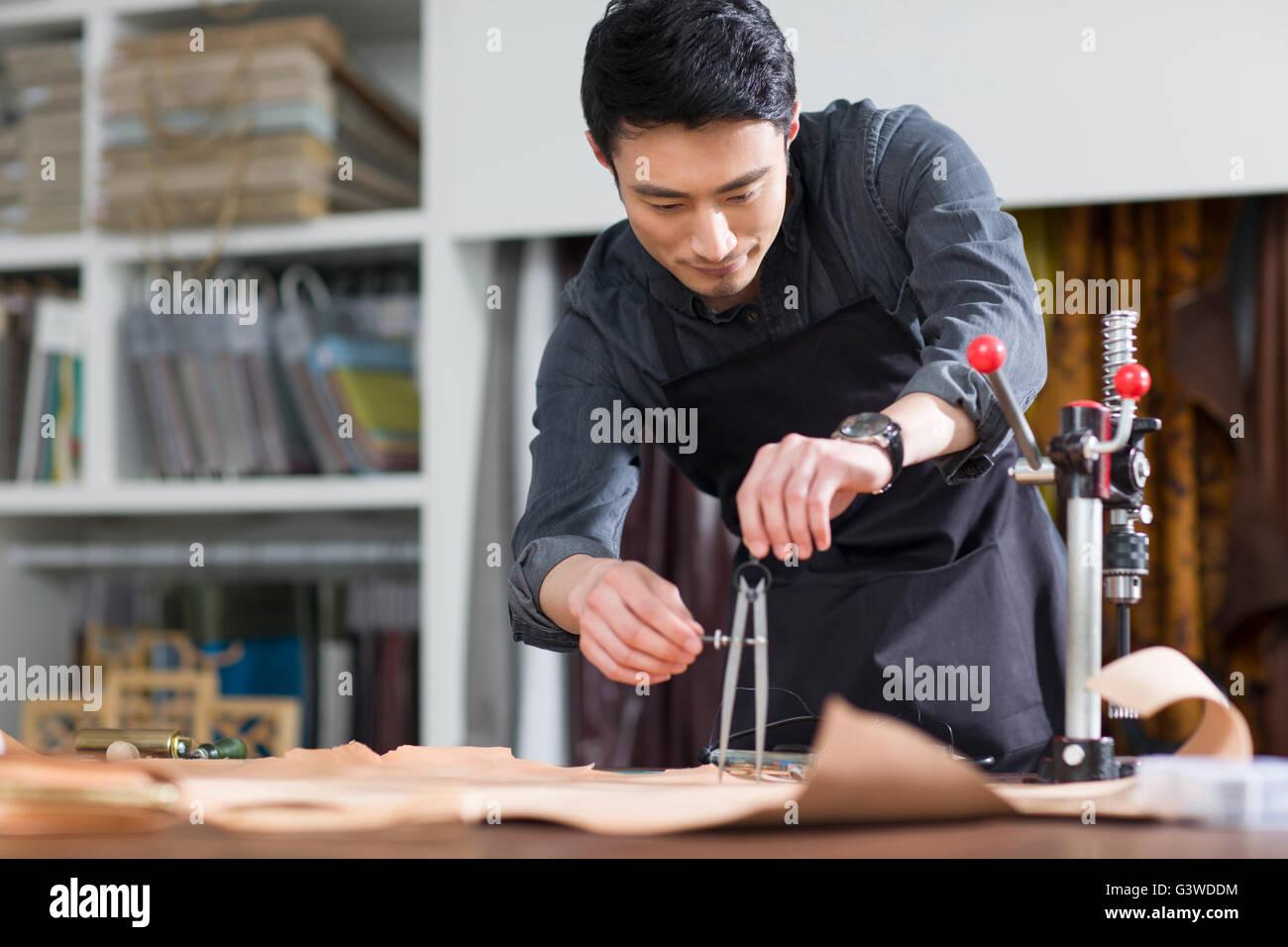 Craftsman working in his studio Stock Photo - Alamy