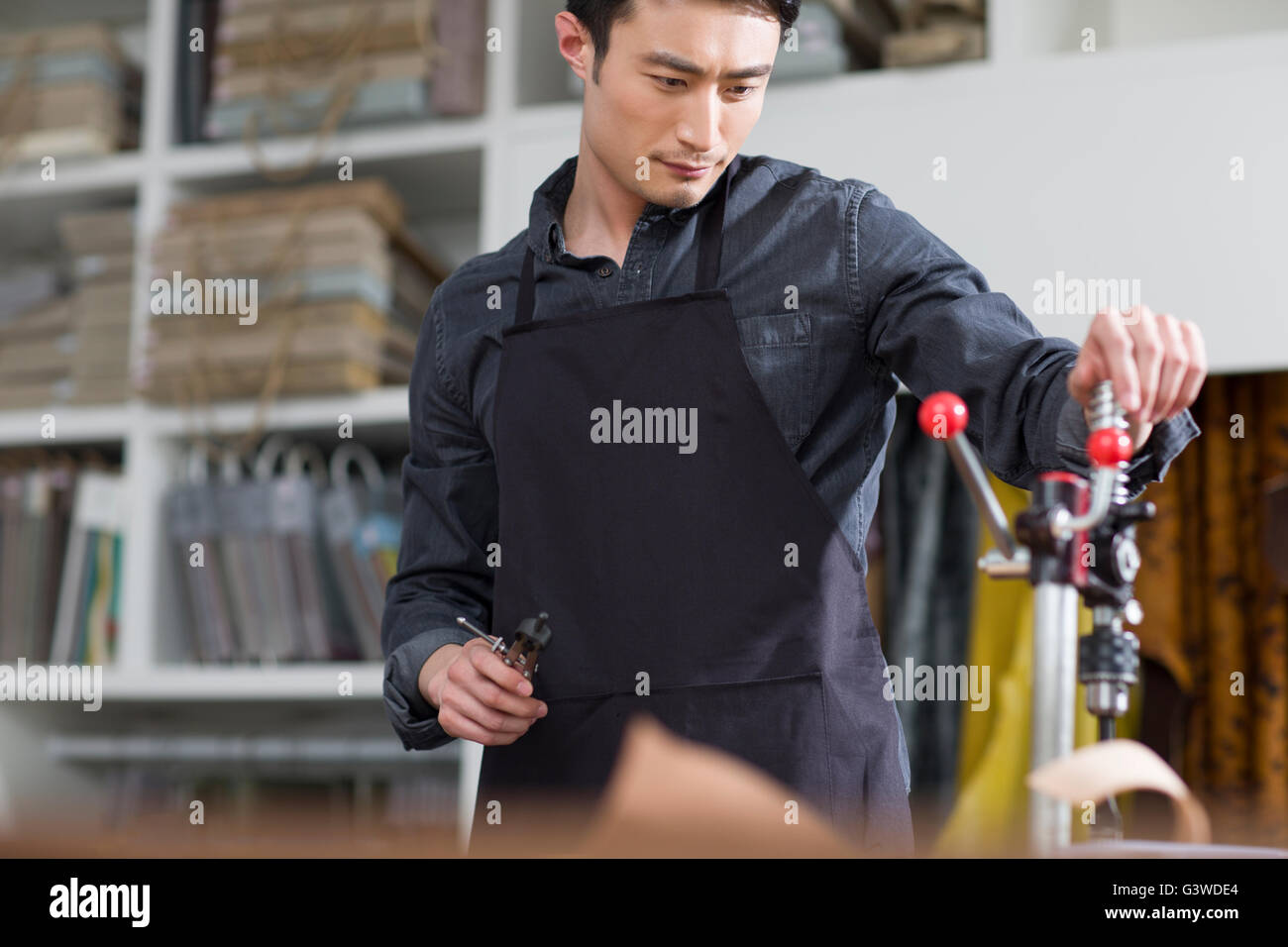 Craftsman working in his studio Stock Photo - Alamy
