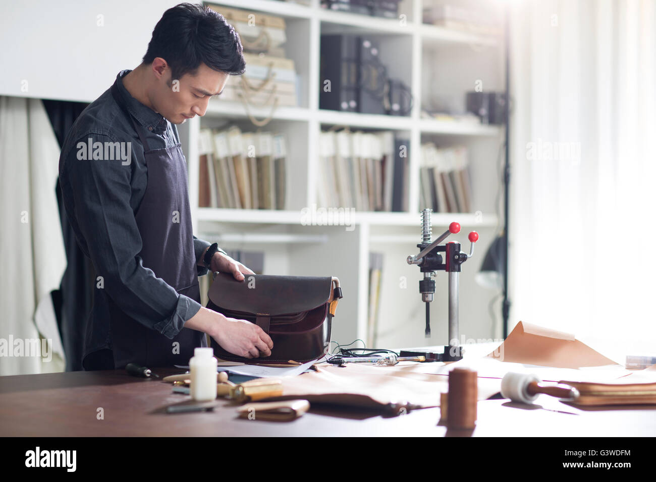 Craftsman working in his studio Stock Photo - Alamy