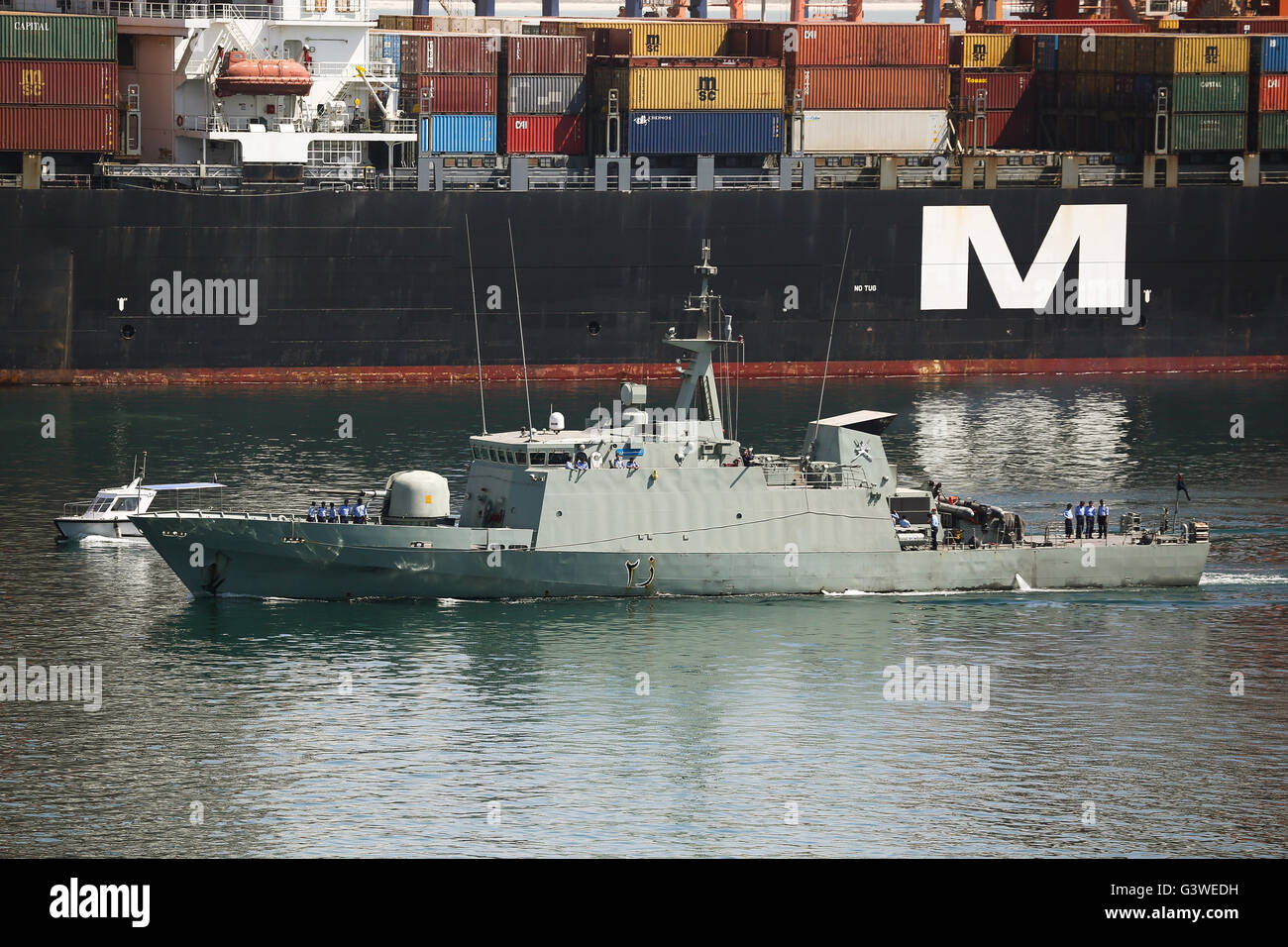 navy warship arriving at Port of Salalah Oman. Omani ship in service ...