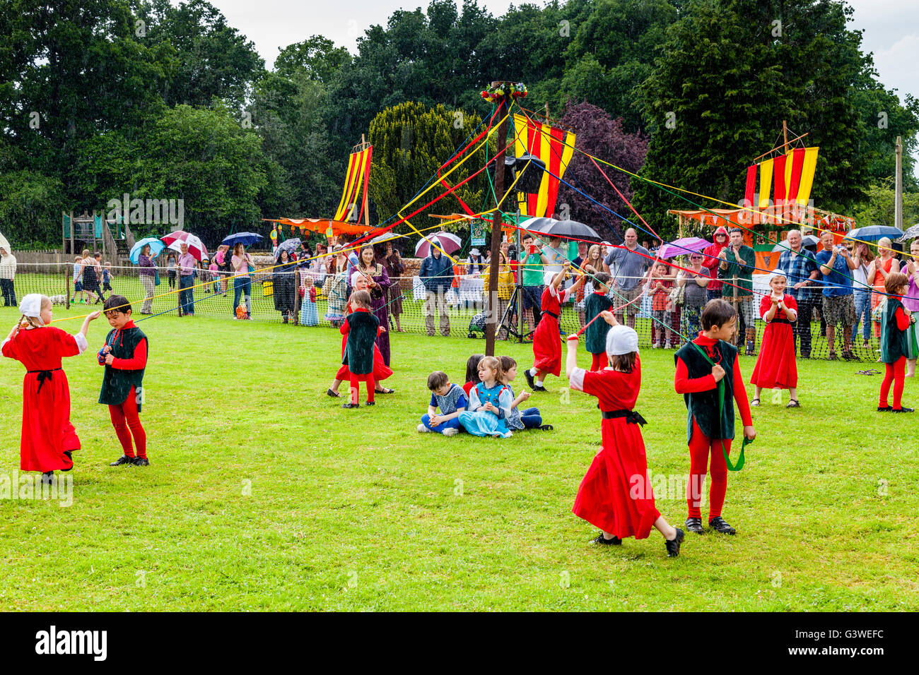 Village green fete maypole hi-res stock photography and images - Alamy