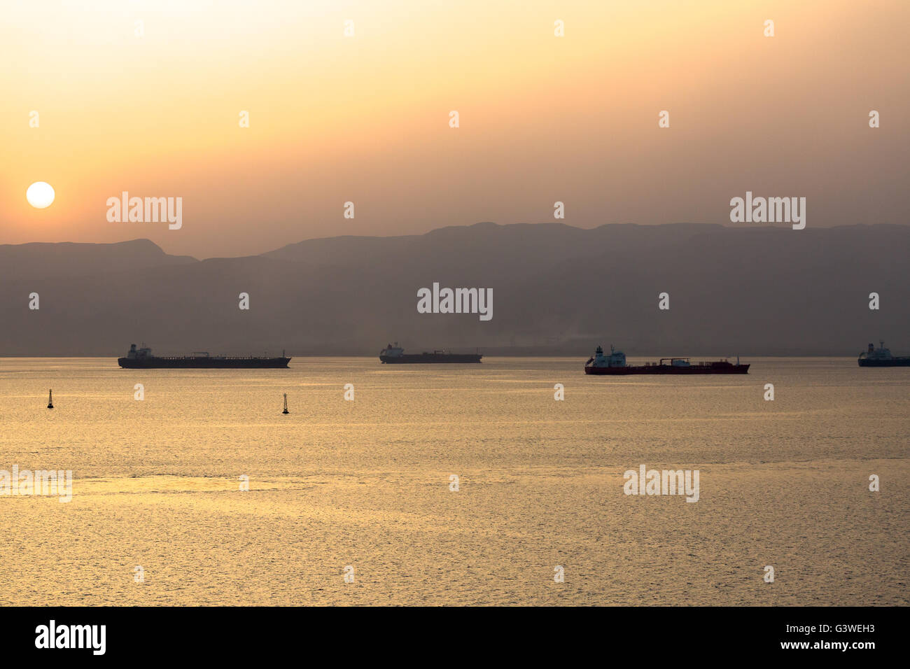 Ships gathering for night convoy through Suez canal. Red Sea Egypt ...