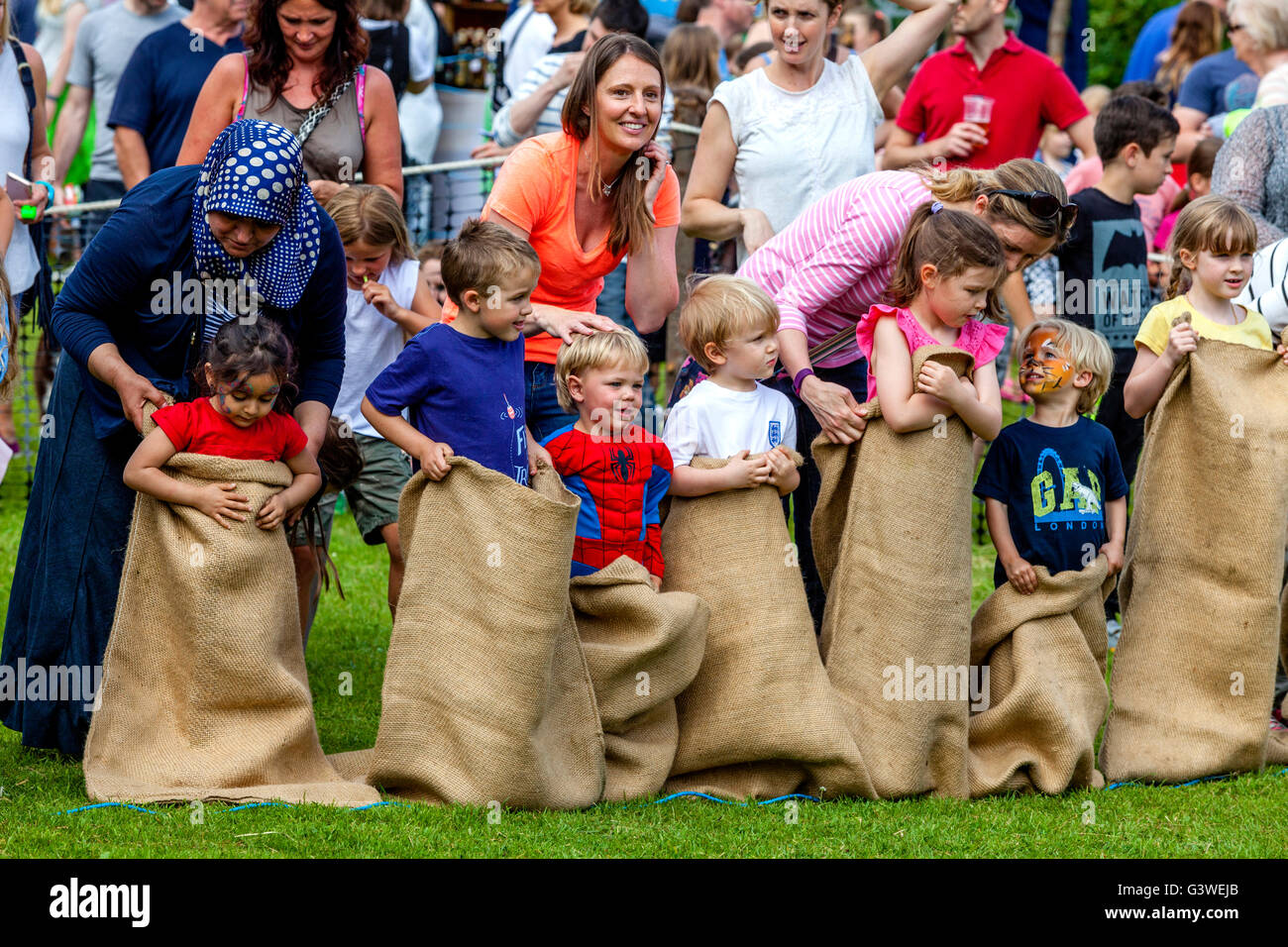 Children Prepare To Race In A Traditional Sack Race At The Medieval ...