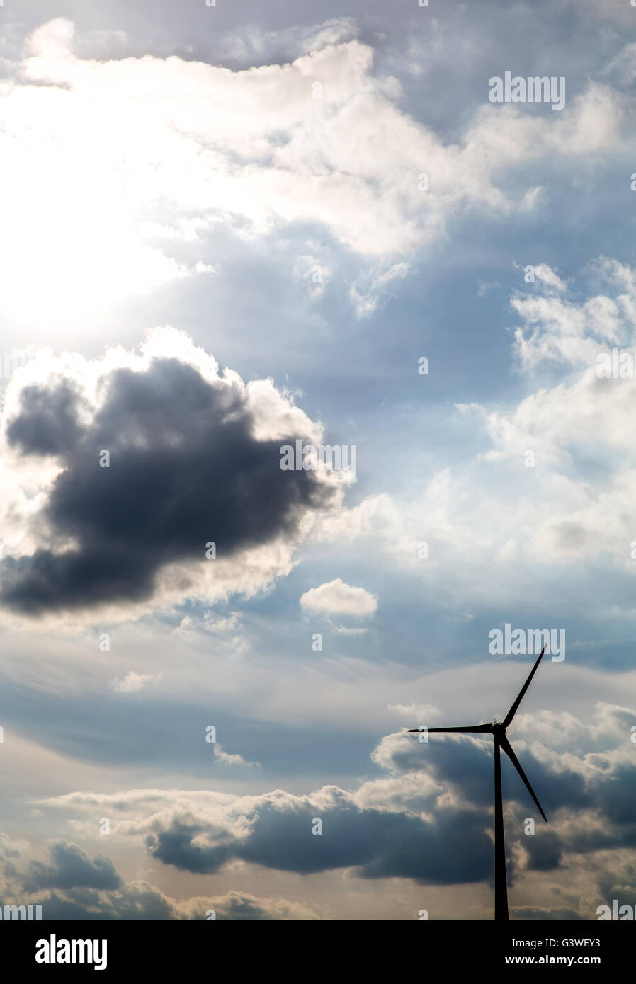Wind turbine under a dramatic sky Stock Photo - Alamy