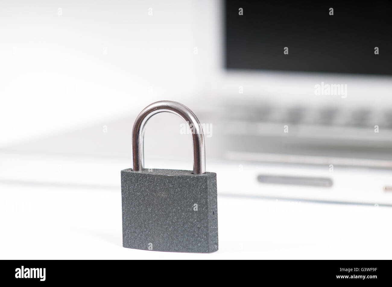 Internet security concept with a laptop computer being protected from ...