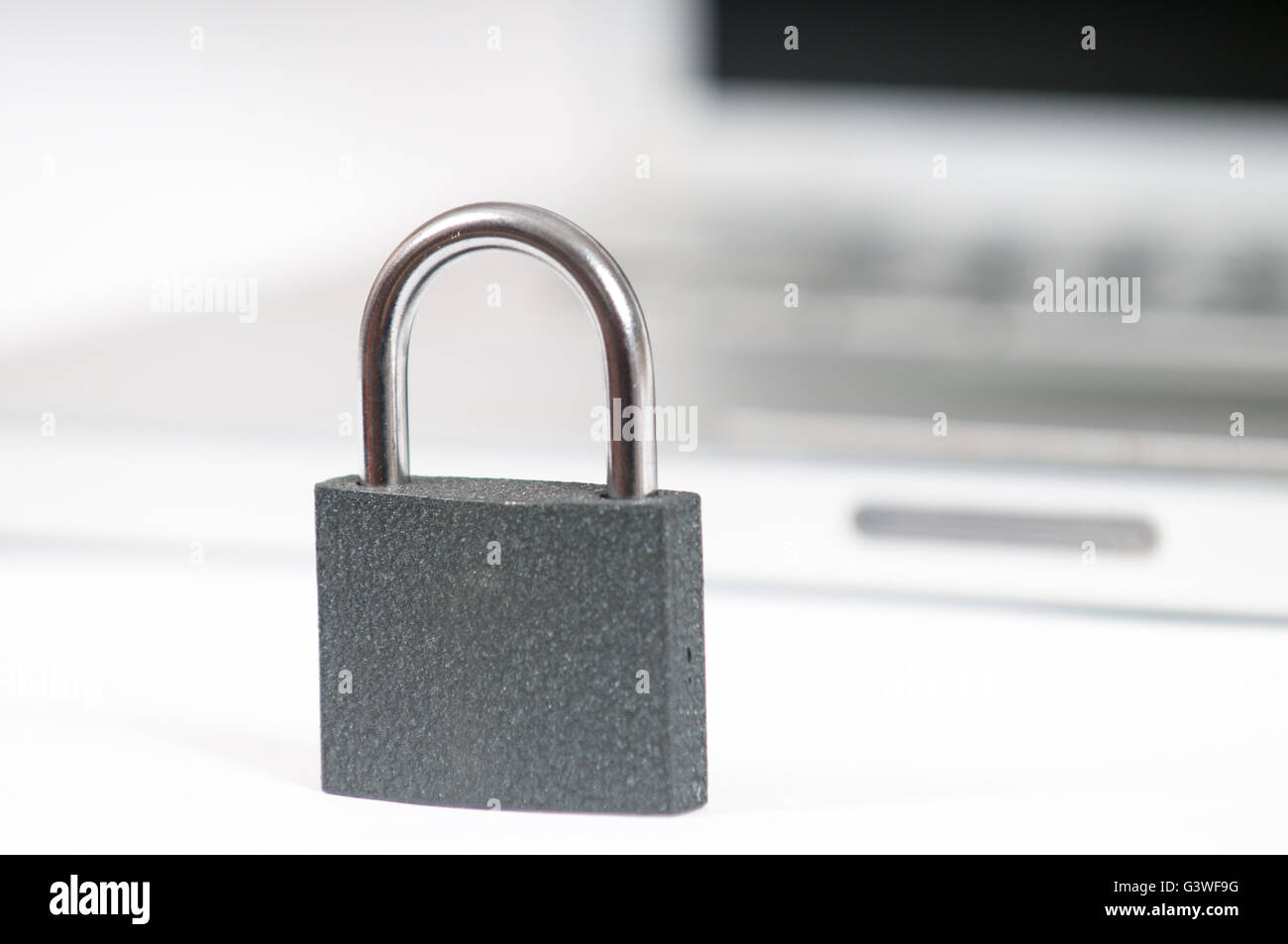 Internet security concept with a laptop computer being protected from ...