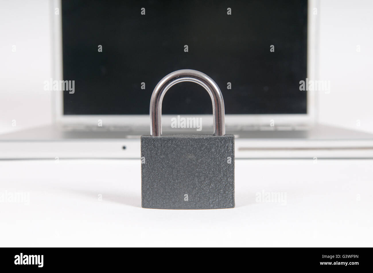 Internet security concept with a laptop computer being protected from ...