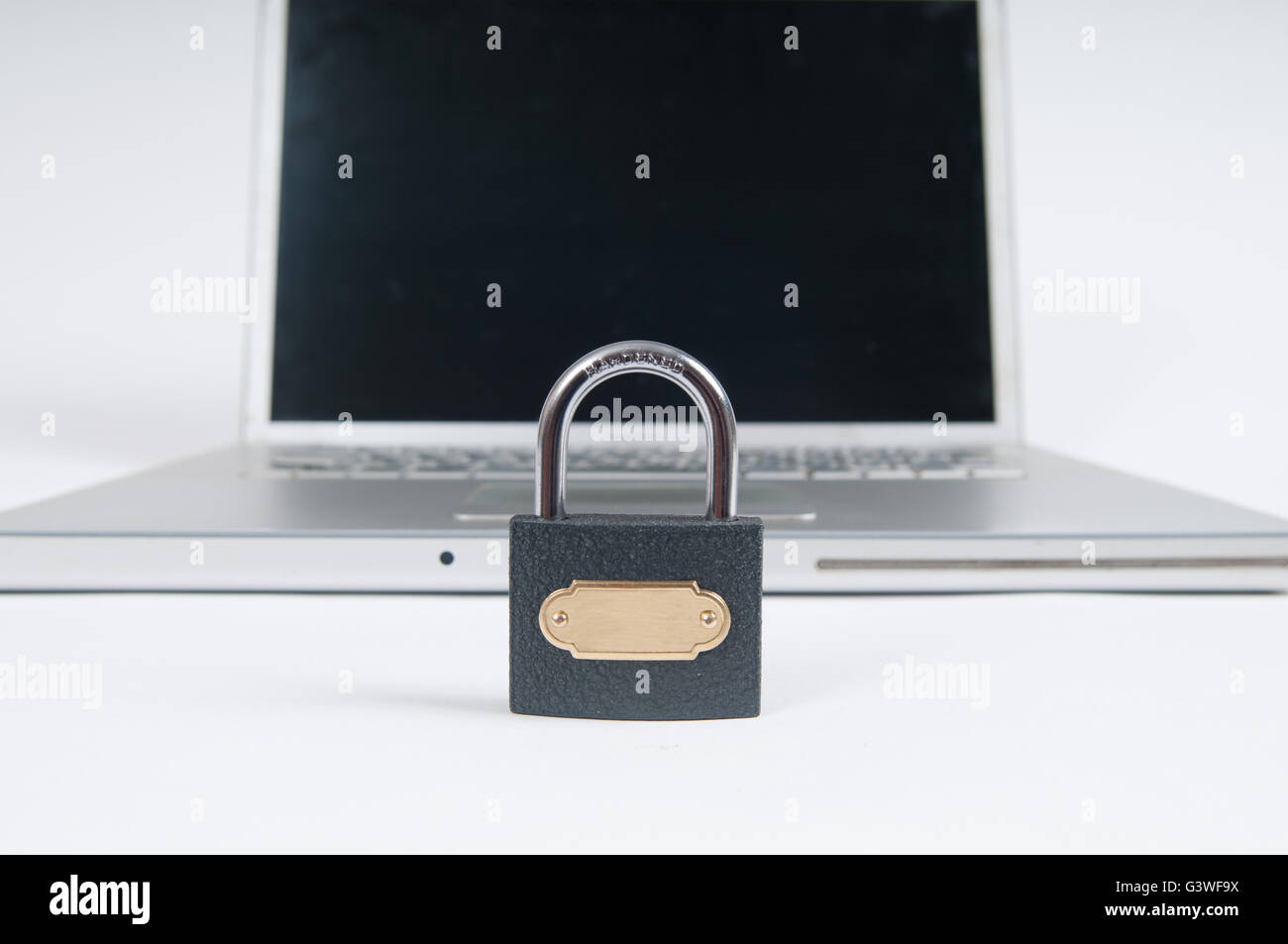 Internet security concept with a laptop computer being protected from ...
