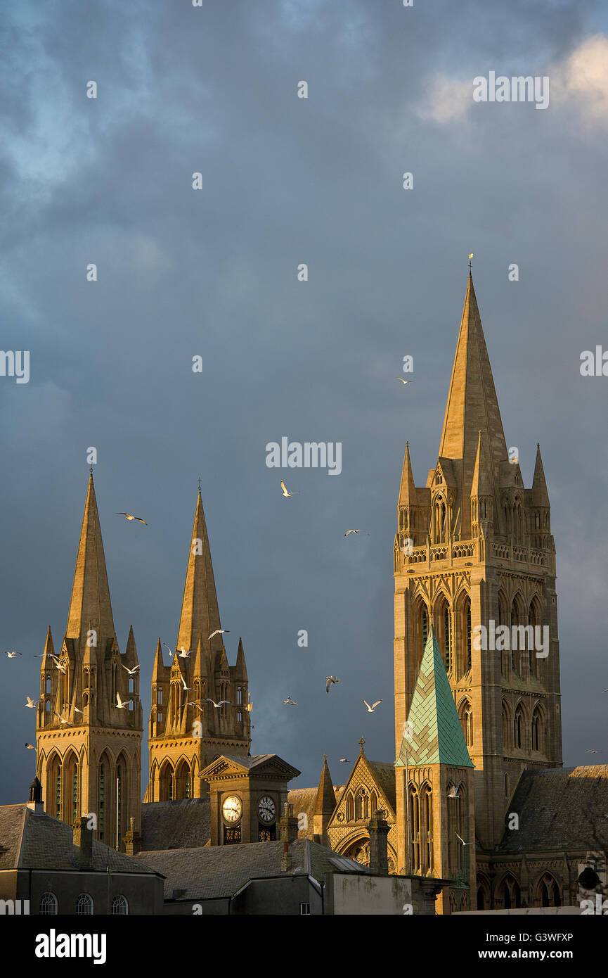 The sandblasted spires of Truro Cathedral bathed in sunlight with ...