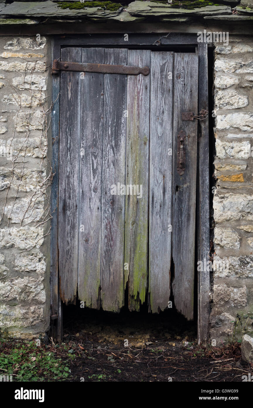 Old rotten door in a village graveyard Stock Photo - Alamy