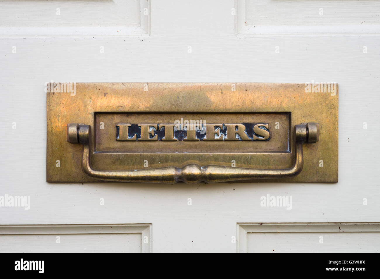 Traditional or period front door letterbox Stock Photo - Alamy