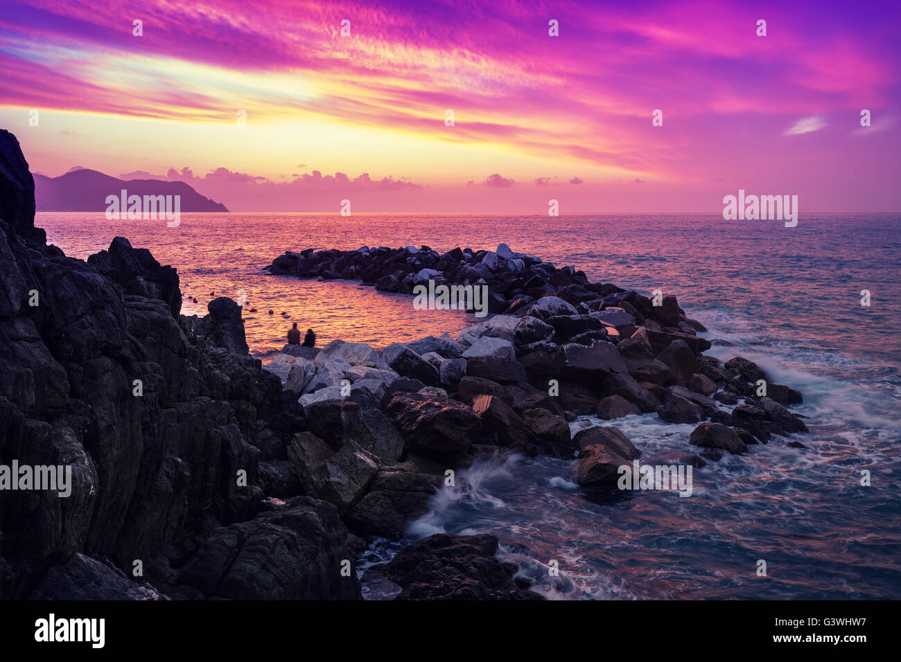 Sunset over rocky coast. Cinque Terre Stock Photo - Alamy