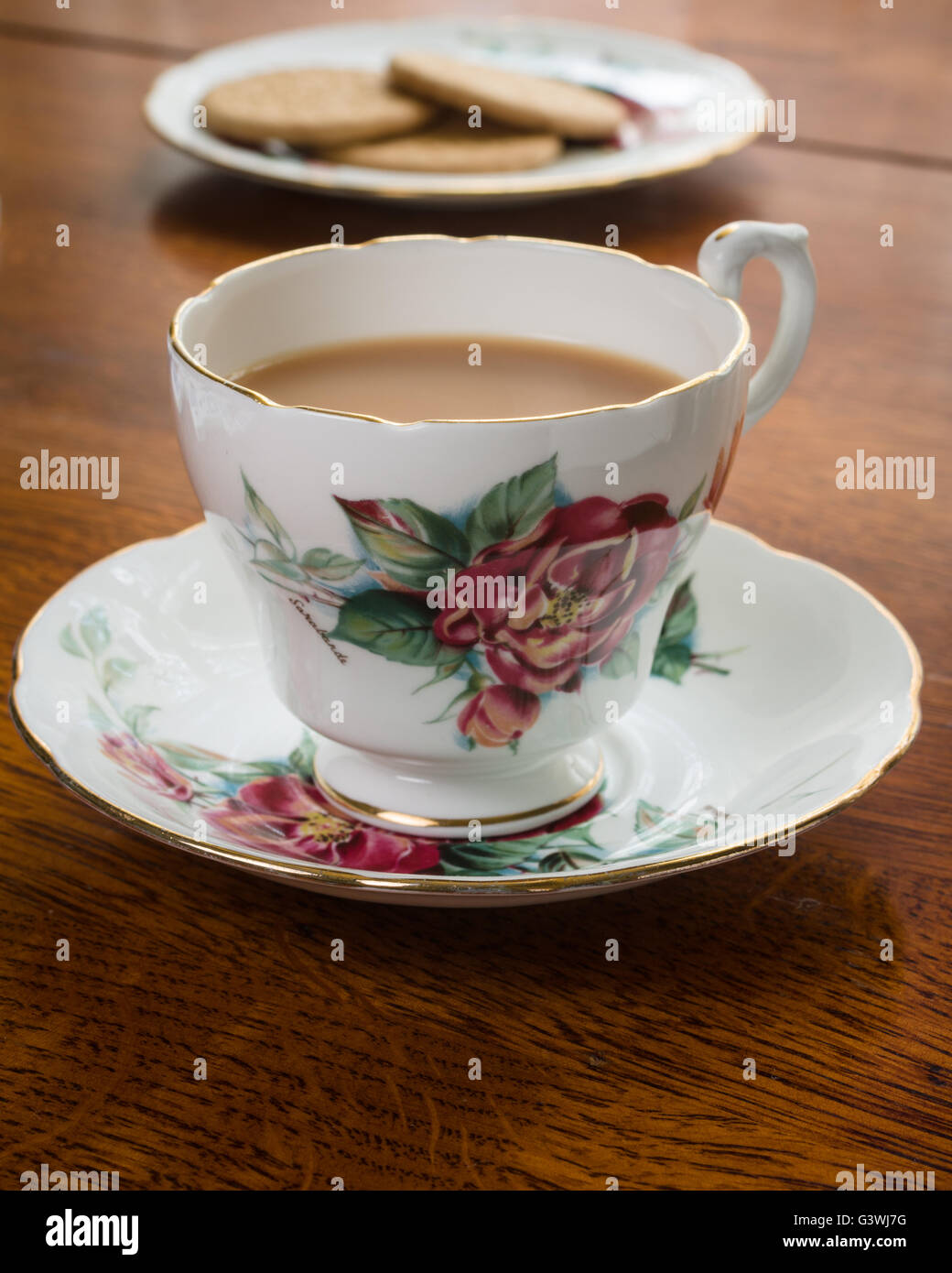 Relaxing cup of tea on a hard wood table Stock Photo - Alamy