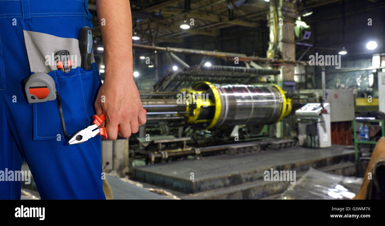 Worker with instruments Stock Photo - Alamy