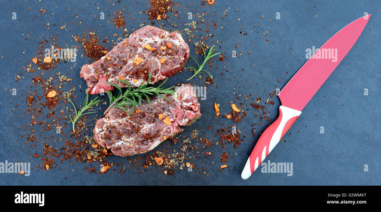Meat and ingredients for cooking top view on stone table hi-res stock ...