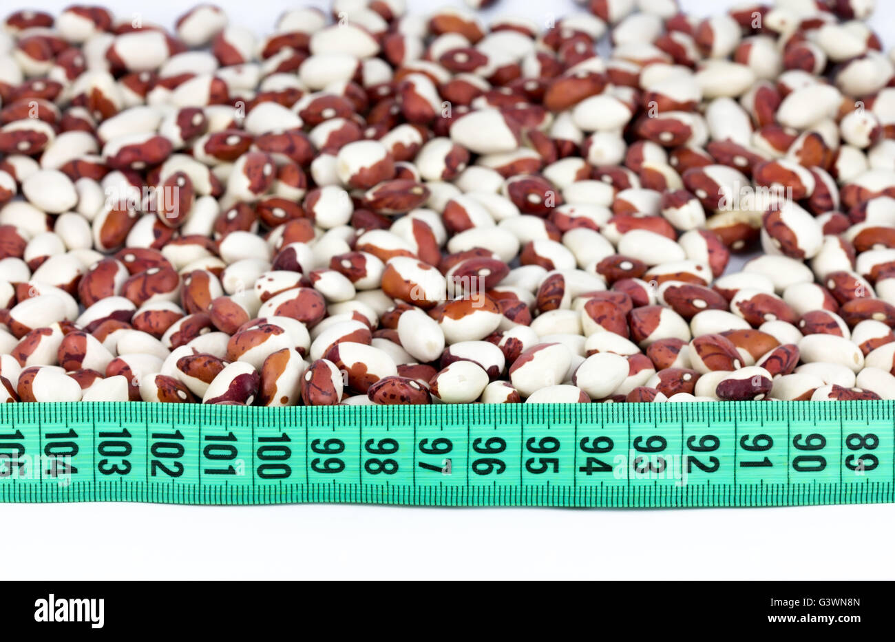 Bean with a tape measure Stock Photo - Alamy