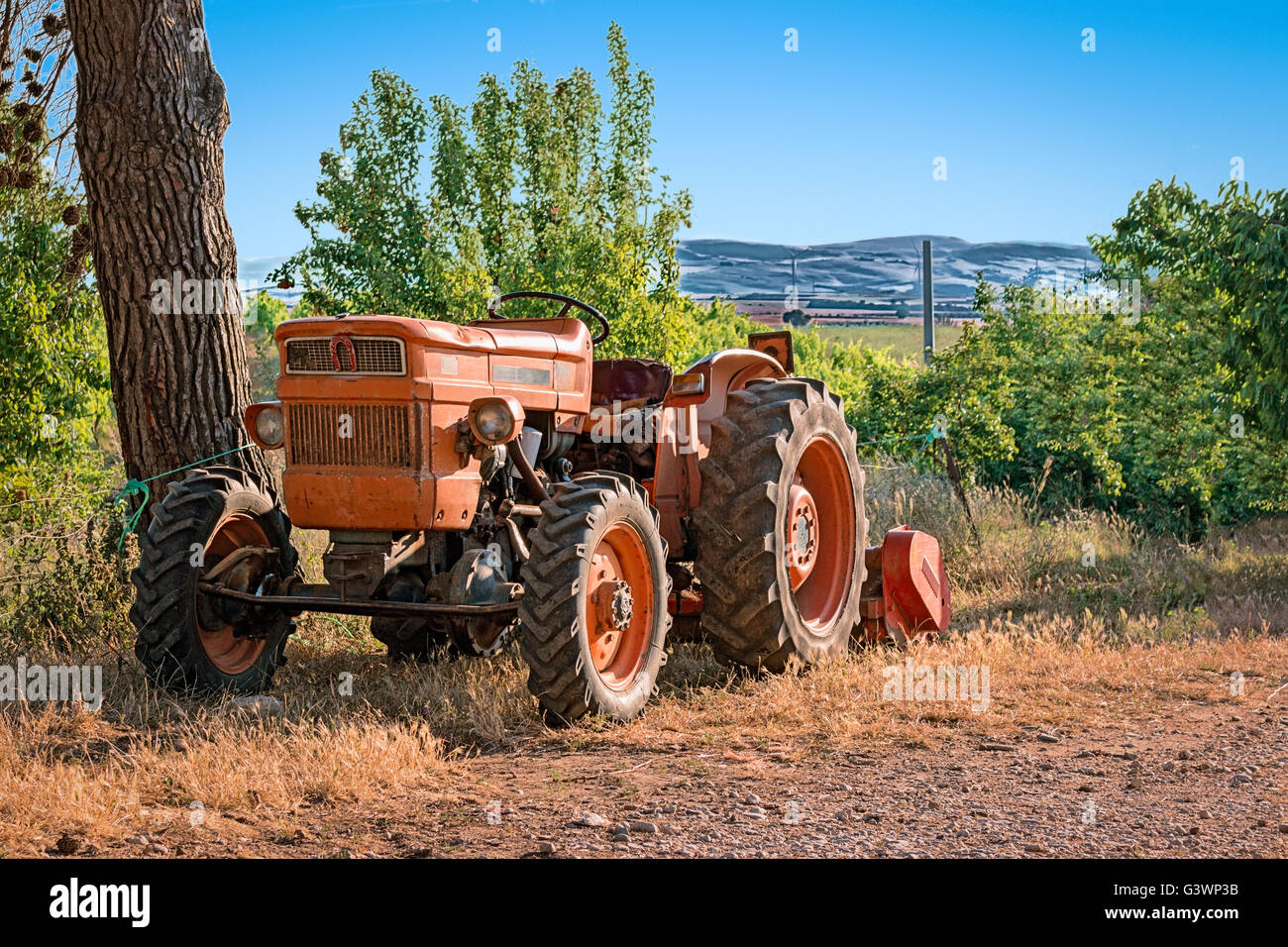 red tractor in farm Stock Photo - Alamy