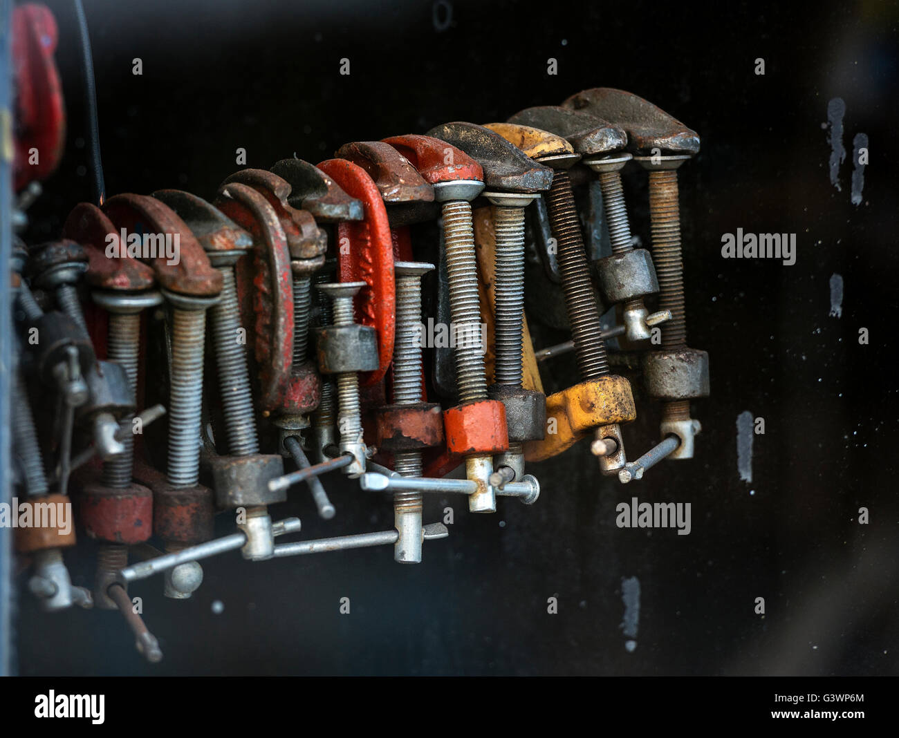 Set of old vise in a workshop Stock Photo - Alamy