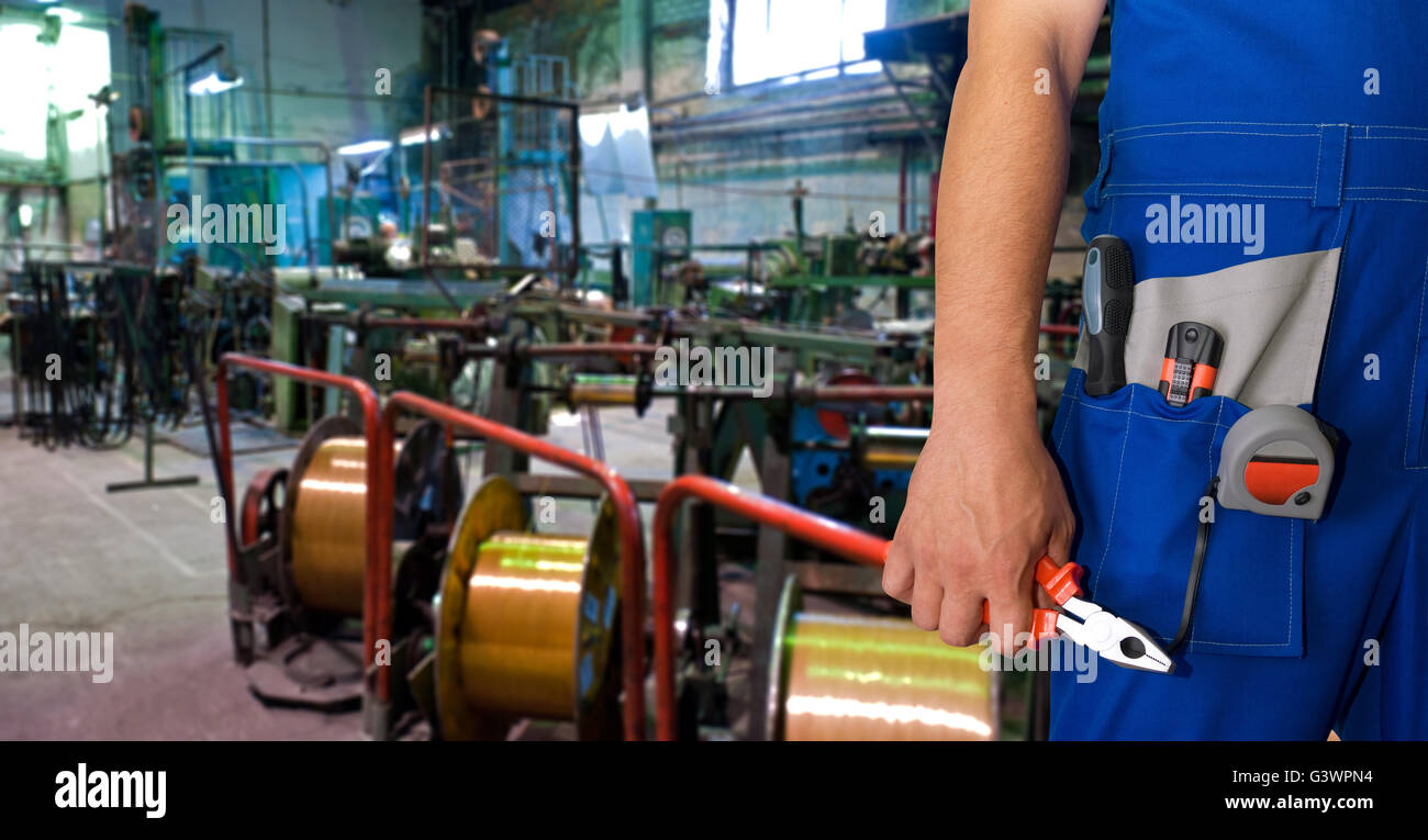 Worker with instruments Stock Photo - Alamy