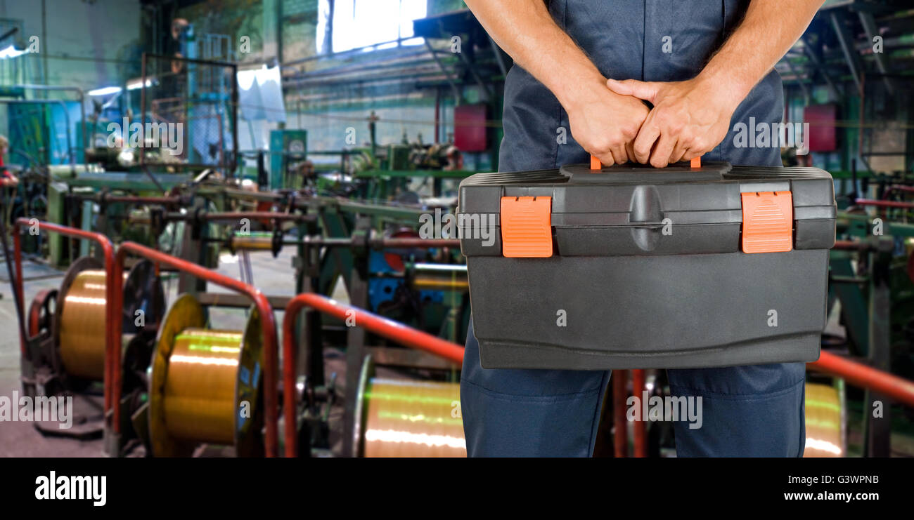 Worker with instruments Stock Photo - Alamy