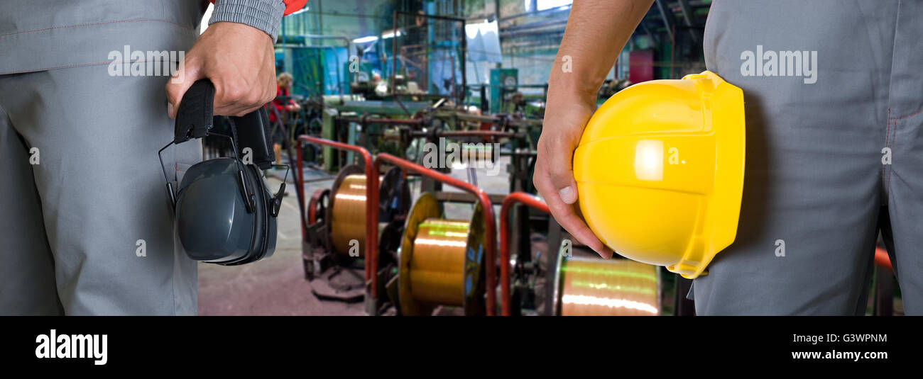 Workers with safety uniform Stock Photo - Alamy