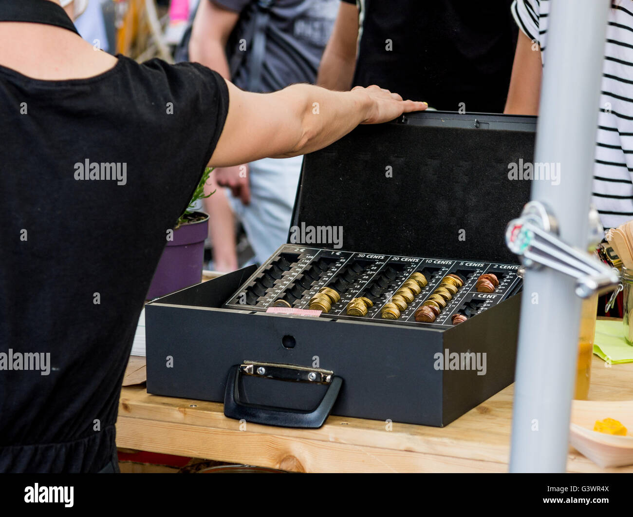 Cash box with euro coins Stock Photo - Alamy