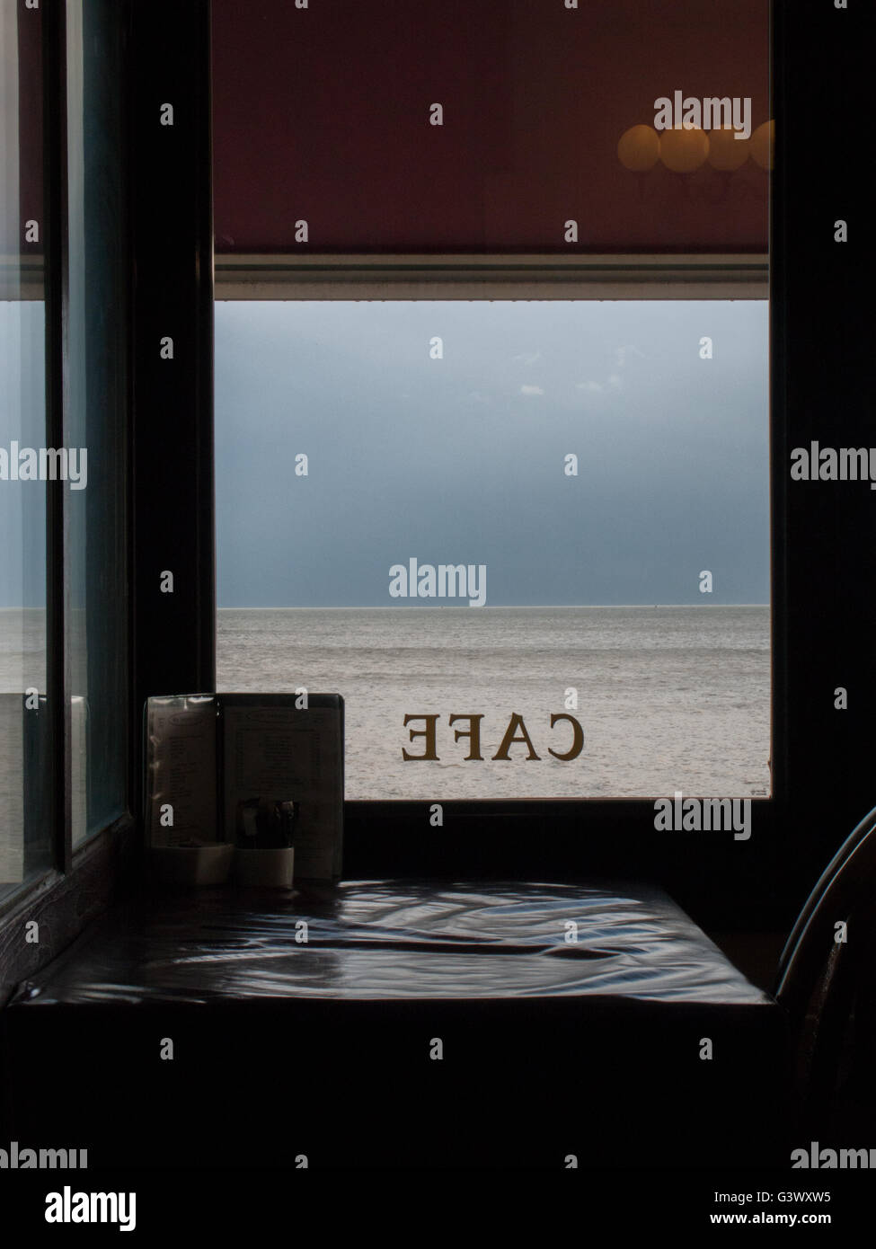 A seaside view through cafe window at Felixstowe Stock Photo - Alamy