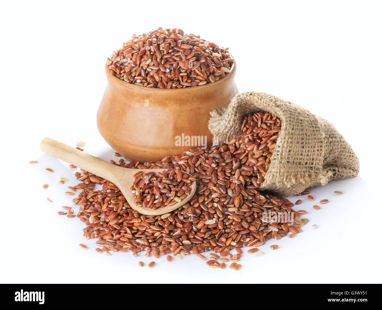 red rice in a bowl isolated on white background Stock Photo - Alamy