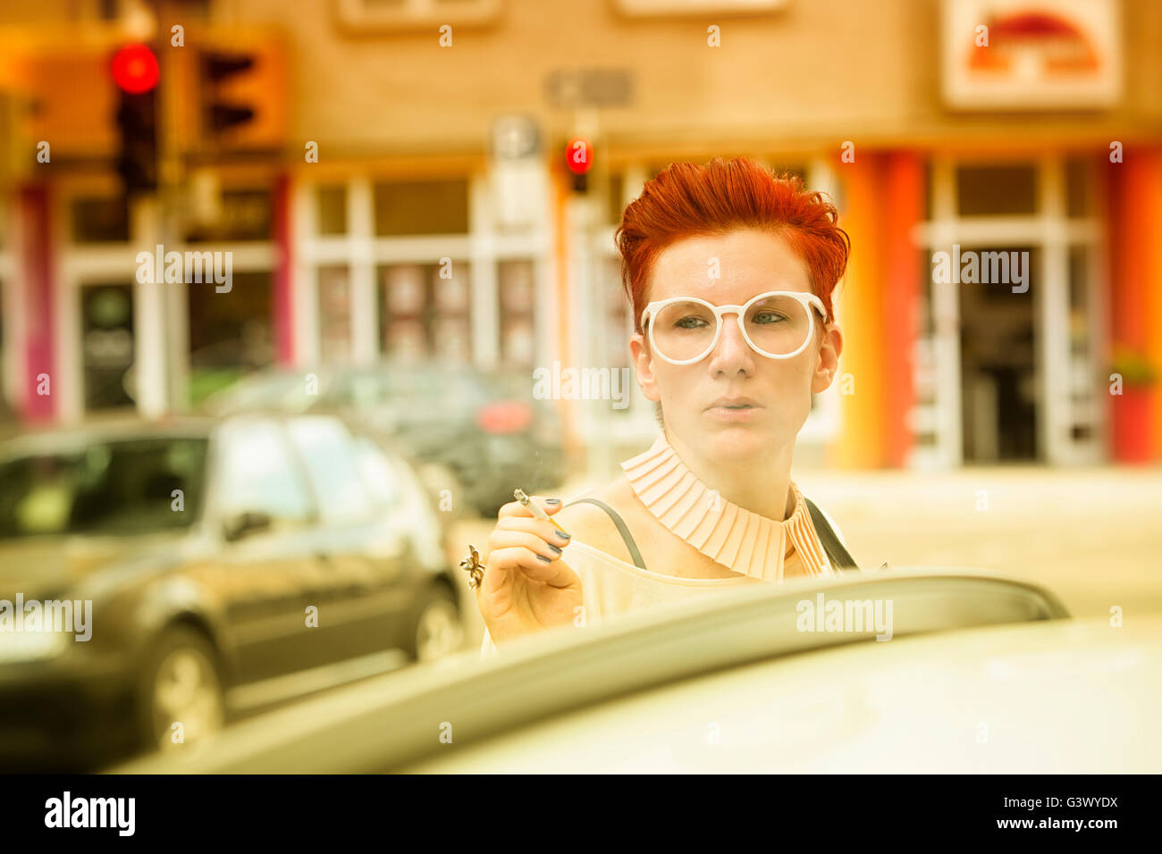 Beautiful redhead woman smoking cigarette hi-res stock photography and ...