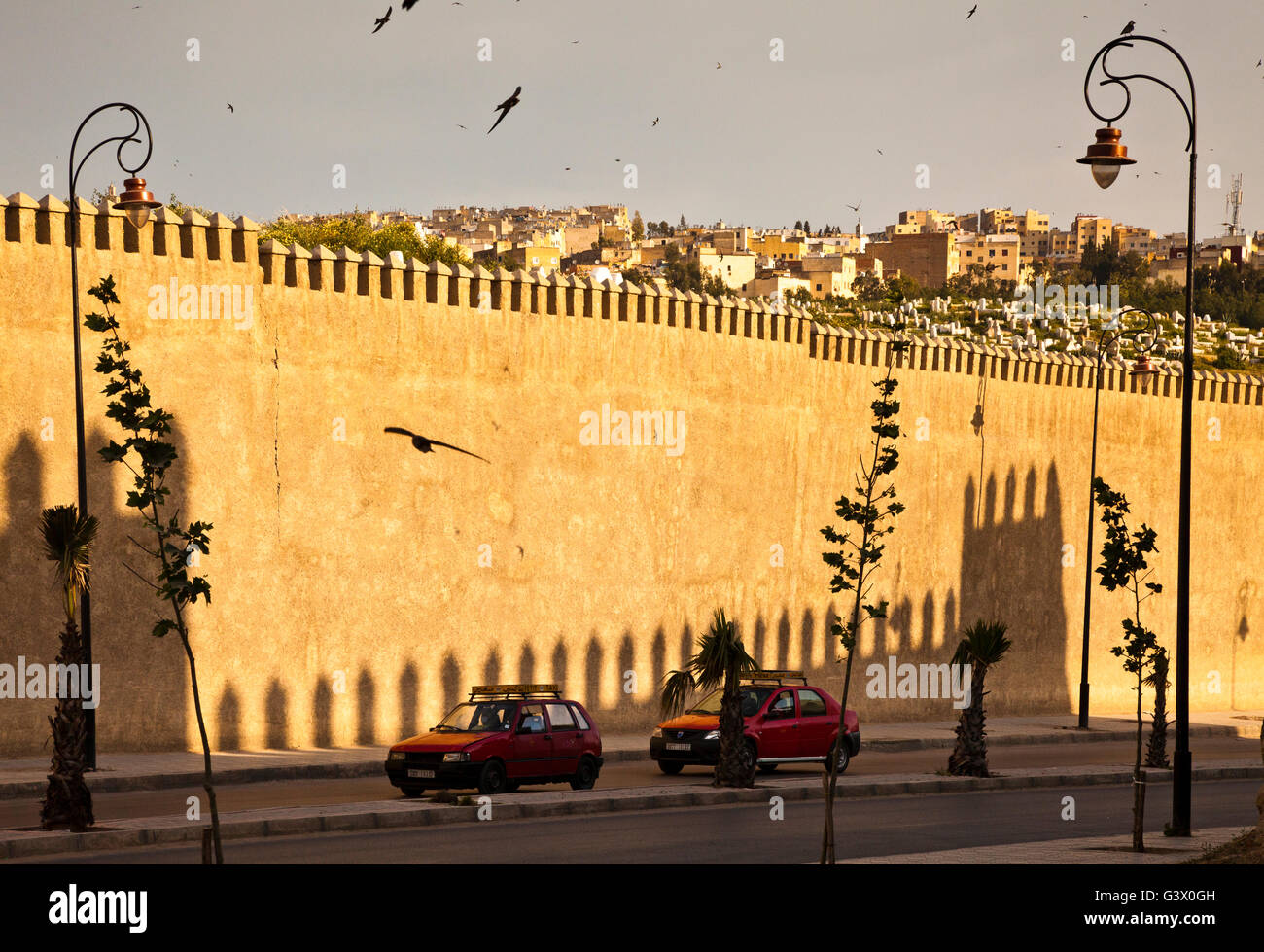 City walls at sunset in Fez ( Fes Fas ) city, UNESCO heritage site in ...