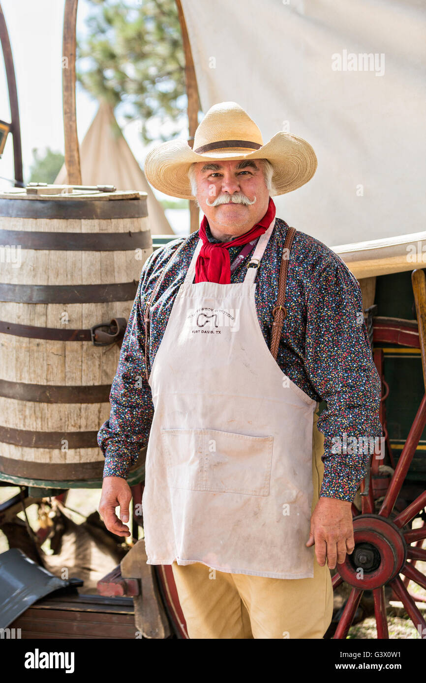 An old cowboy cook during a chuck wagon competition during Cheyenne ...