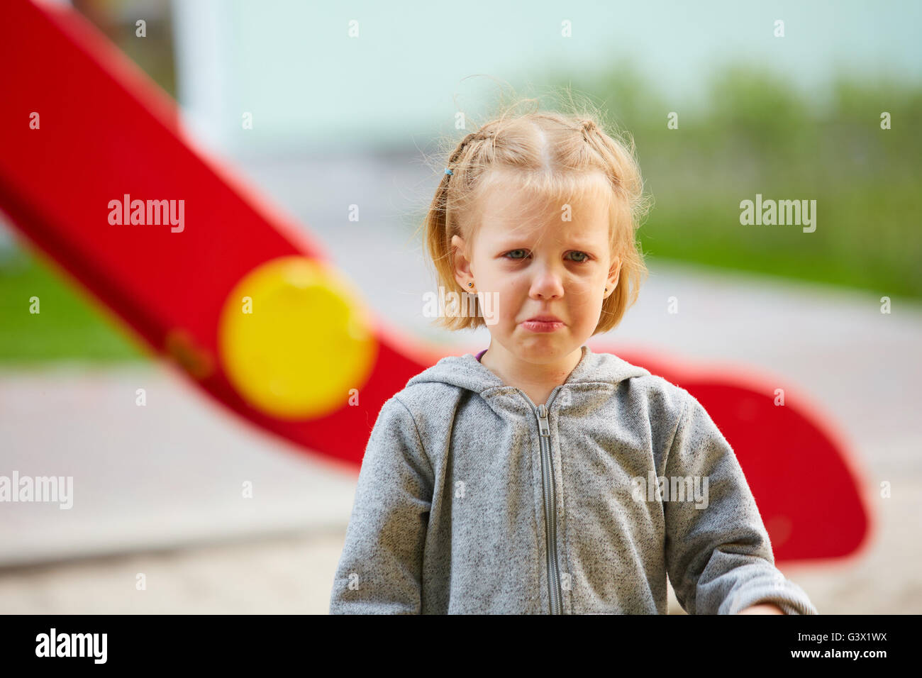 Beautiful sad little girl crying, on summer background Stock Photo - Alamy