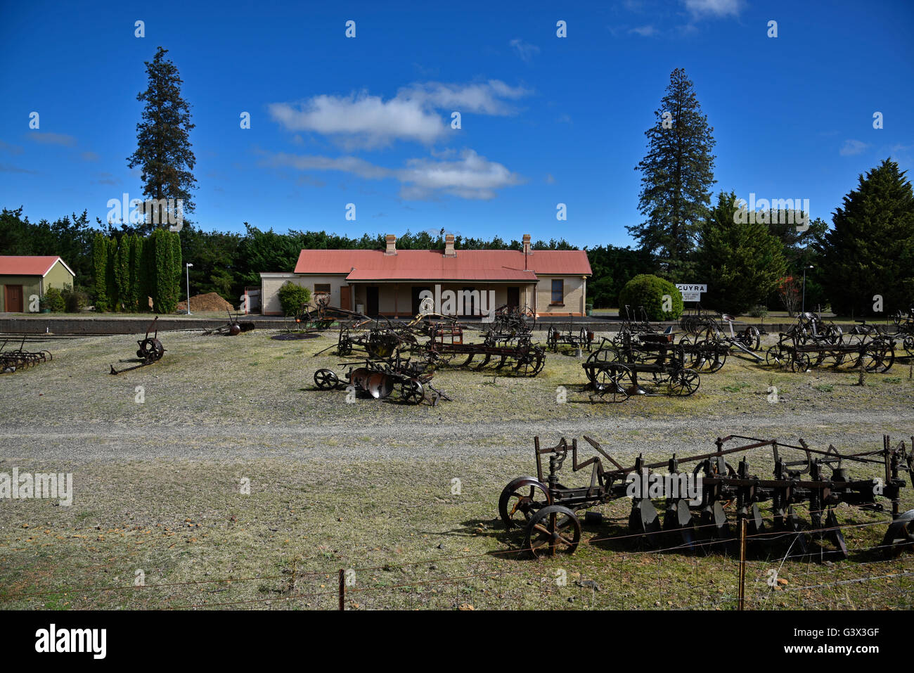 Guyra Railway Station with old farm machinery museum Stock Photo - Alamy