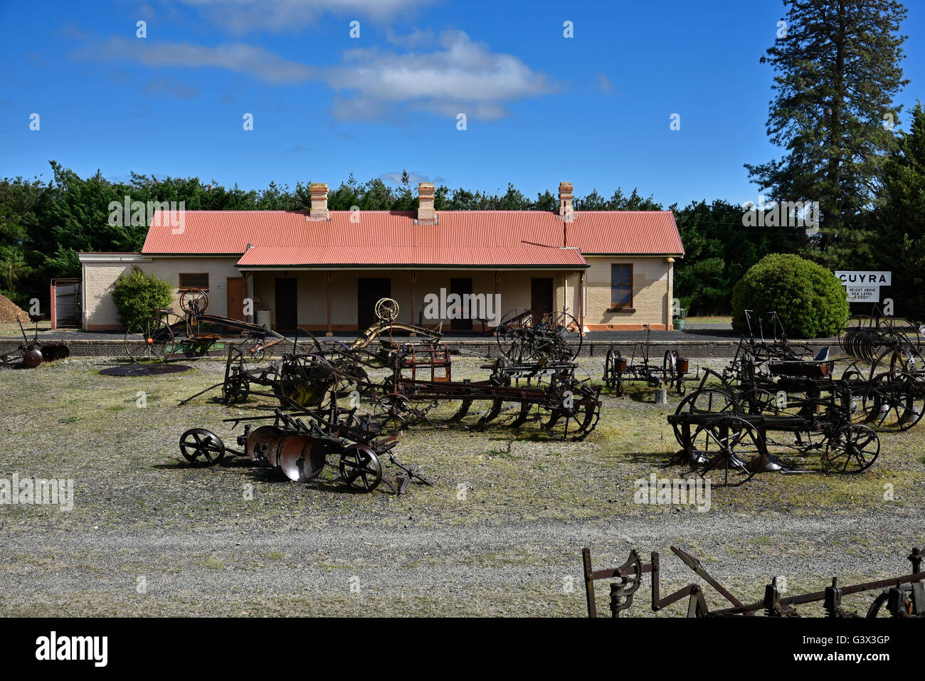 Guyra Railway Station with old farm machinery museum Stock Photo - Alamy