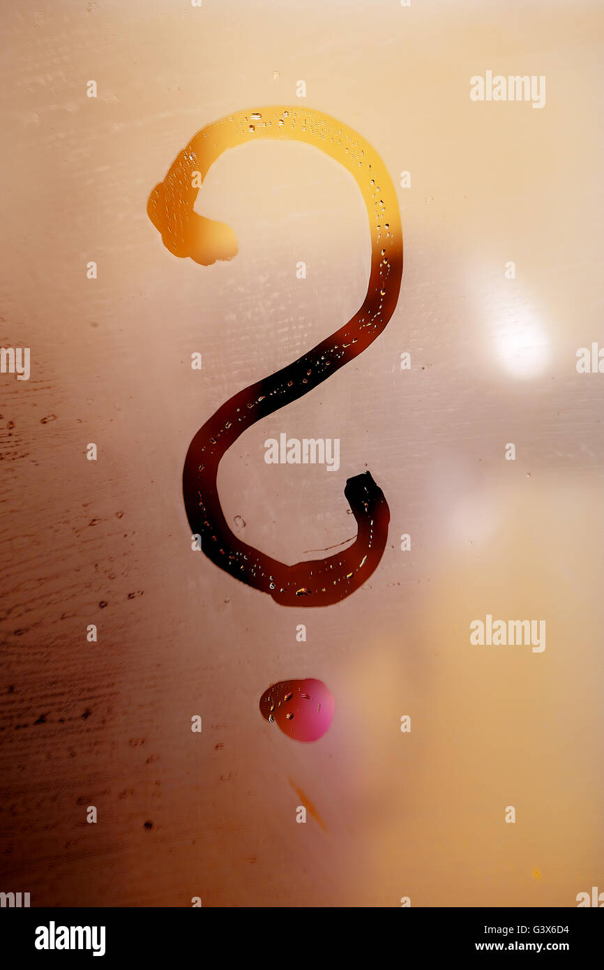 question mark symbol on misty mirror with water droplets Stock Photo ...