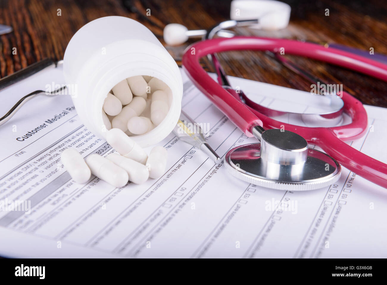Medical concept of medical report with pills and a stethoscope Stock ...