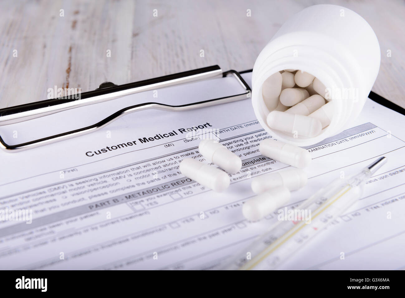 medical concept of medical report with pills and thermometer Stock ...