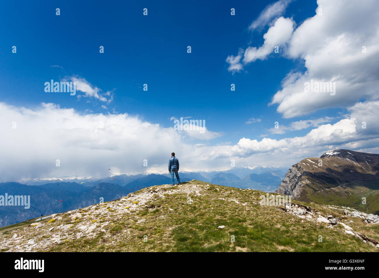 The man on the top of mount of Monte Baldo, Italy Stock Photo - Alamy