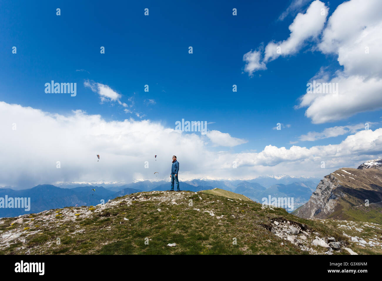 The man on the top of mount of Monte Baldo, Italy Stock Photo - Alamy