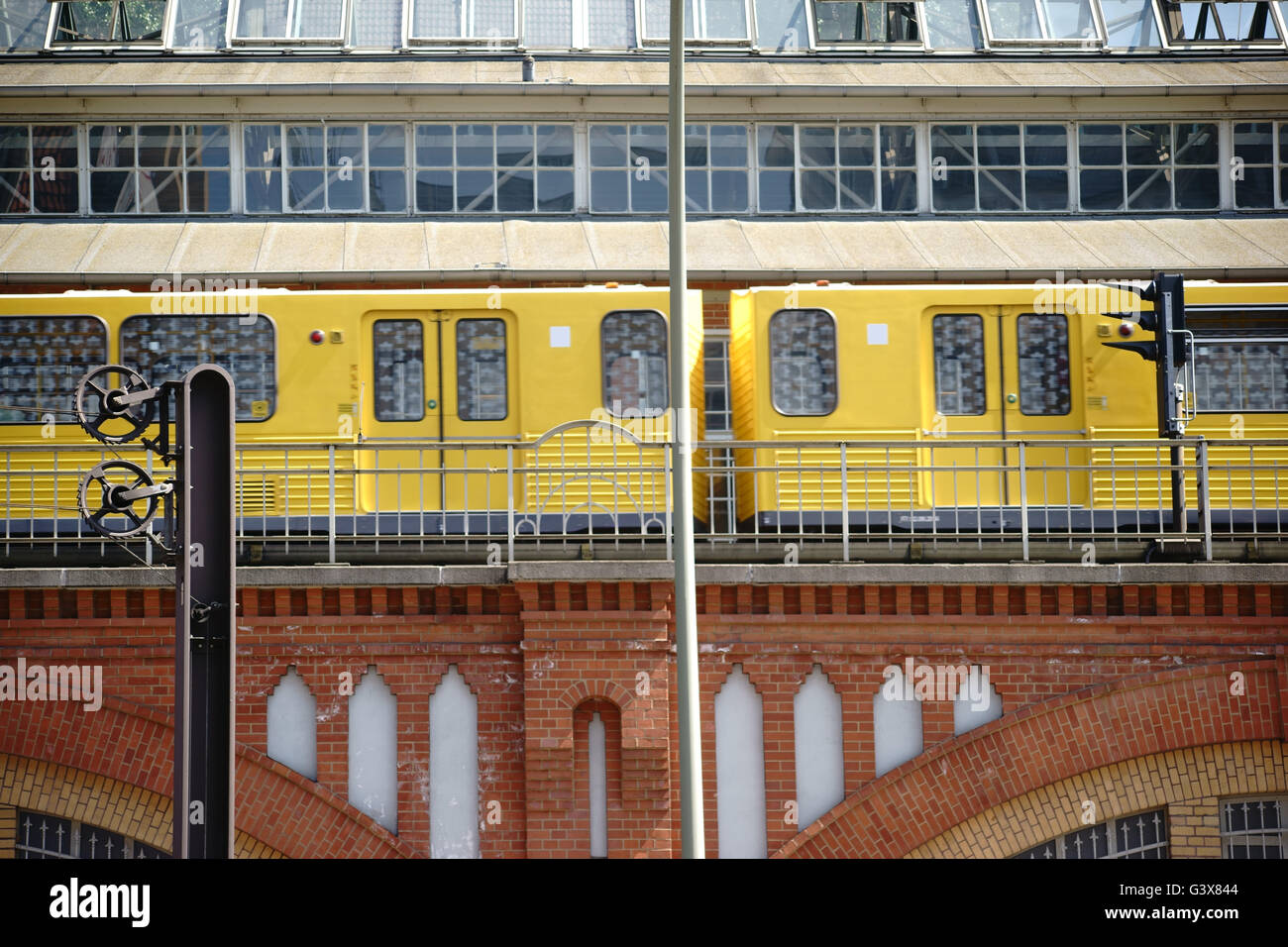 Brick bridge yellow train hi-res stock photography and images - Alamy