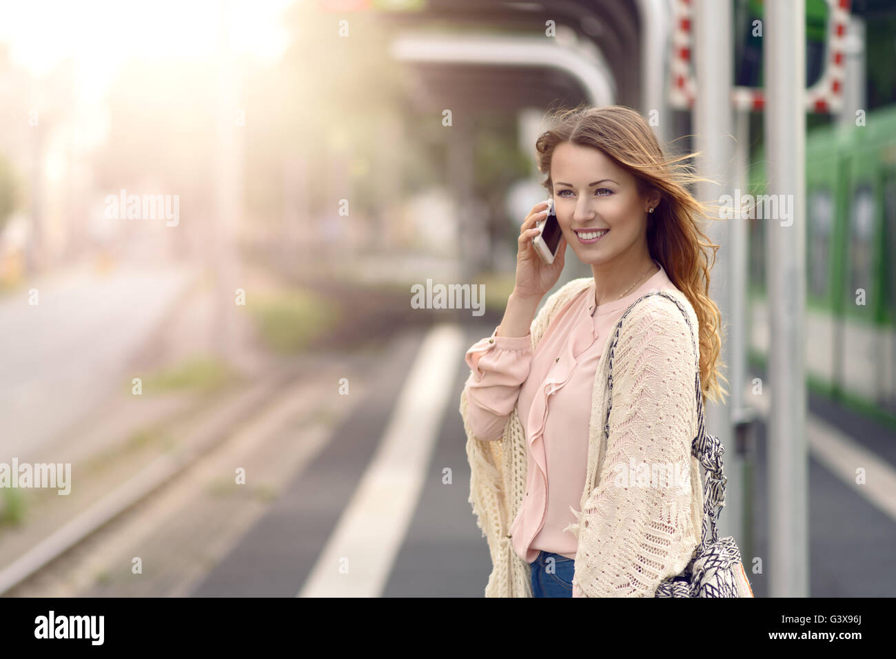 Young woman calling on smartphone hi-res stock photography and images ...