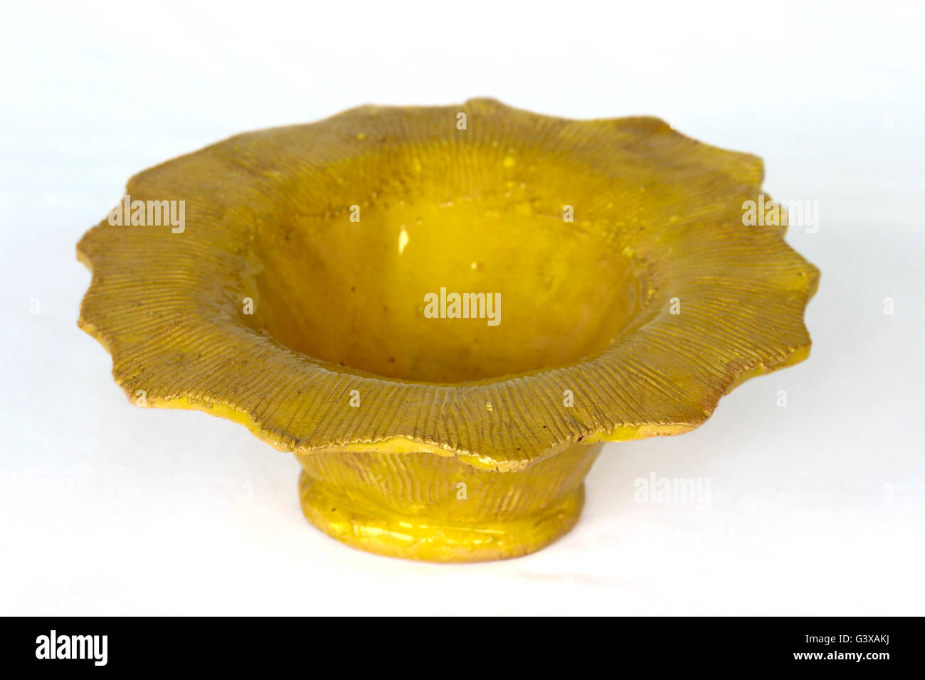 Glazed yellow pot hi-res stock photography and images - Alamy