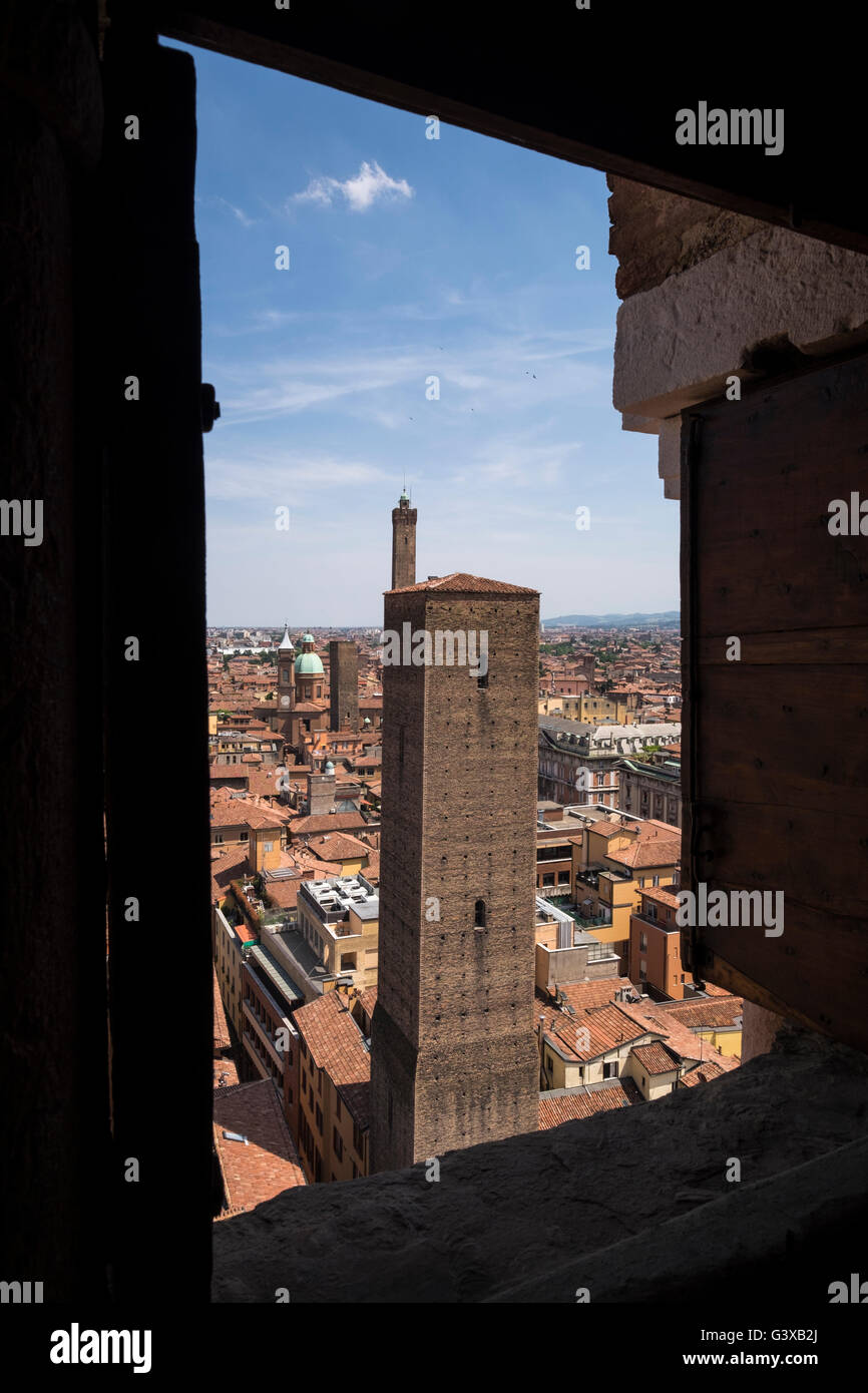 Views over the red tiled rooftops in Bologna from the bell tower of the ...