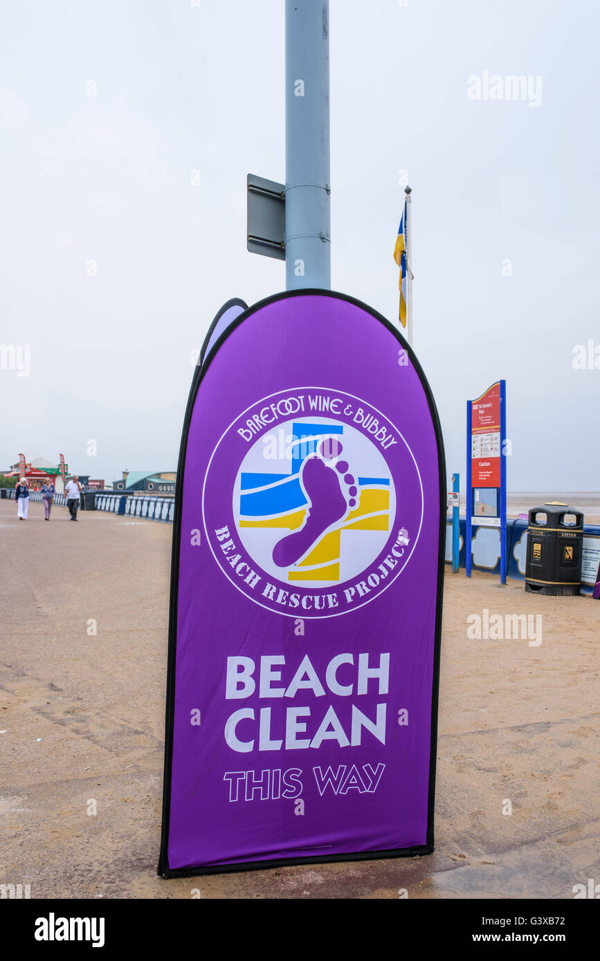 Sign stating "Beach Clean This Way" on a sandy beach in Lytham St Anne ...